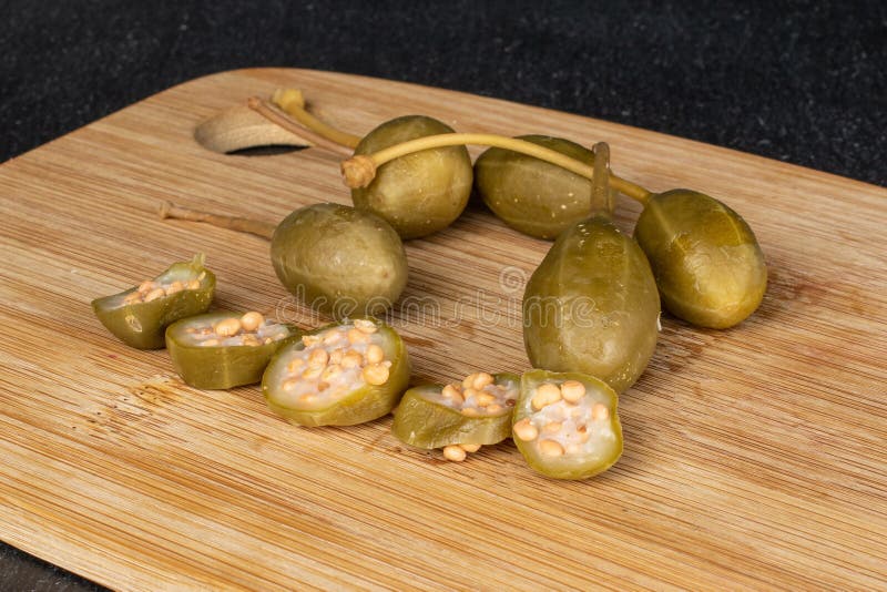 Green Pickled Caper on Grey Stone Stock Image - Image of berry, dark ...