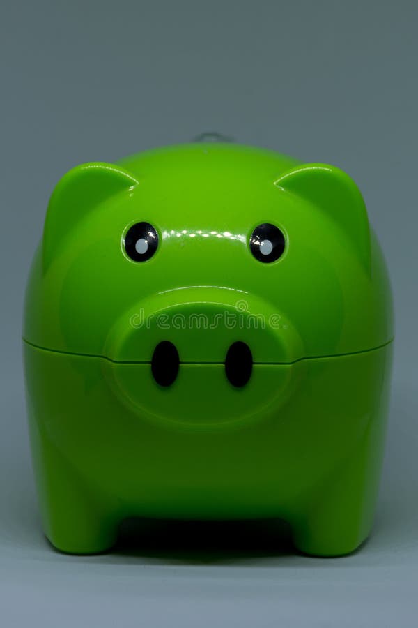Green piggy musical box stock image. Image of efficiency - 142003013