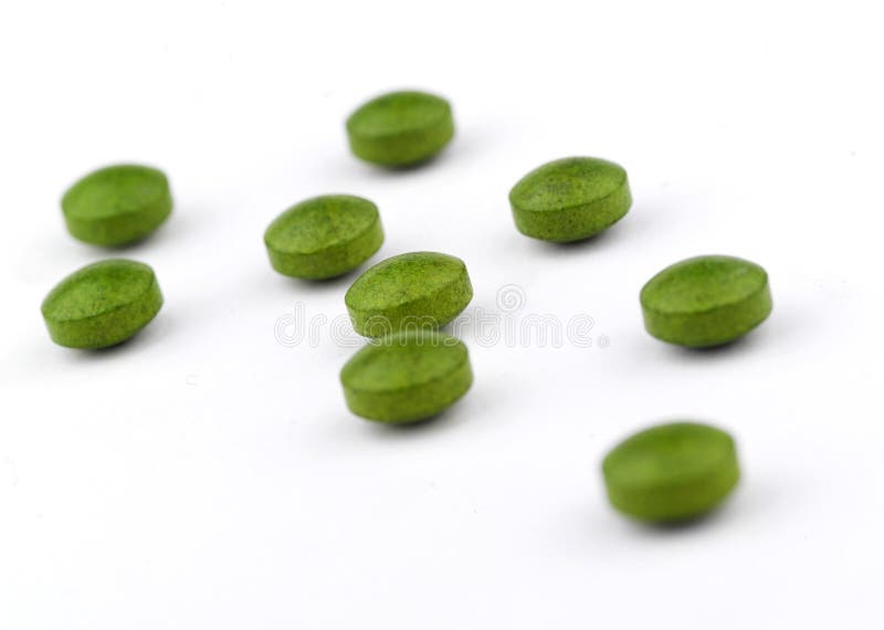 Green pills stock image. Image of drugstore, bottle, isolated - 7562803