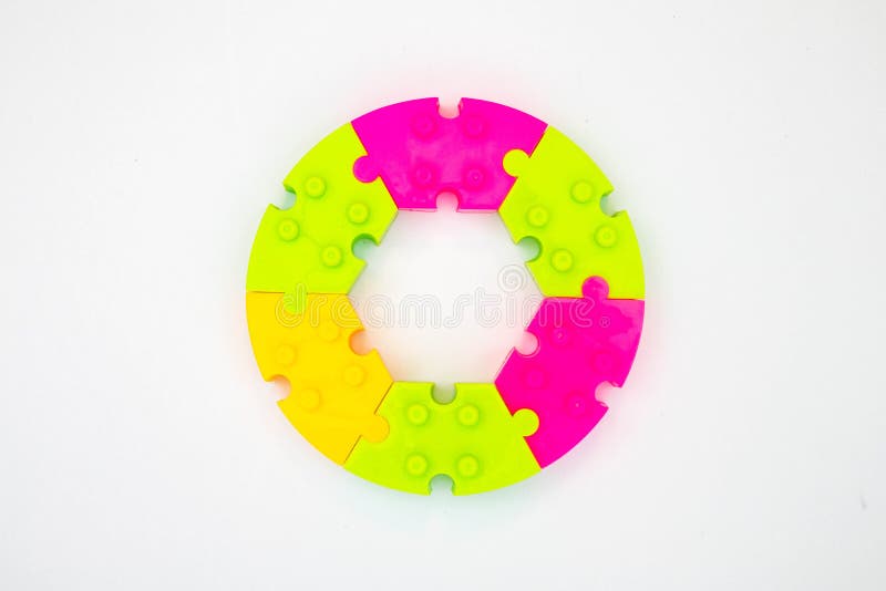 Green, Pink, Yellow Jigsaw Puzzle Pieces on White Background for ...