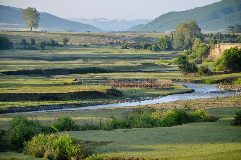 Green Plains in the Sunrise Stock Image - Image of meadow, landscape ...