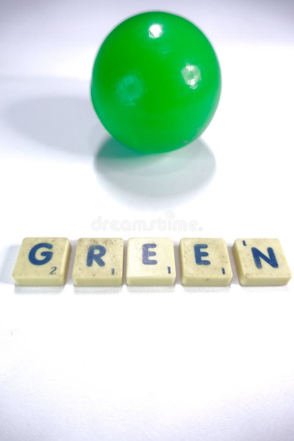 Green Plastic Ball with Plastic Cube with Letters . Stock Image - Image ...