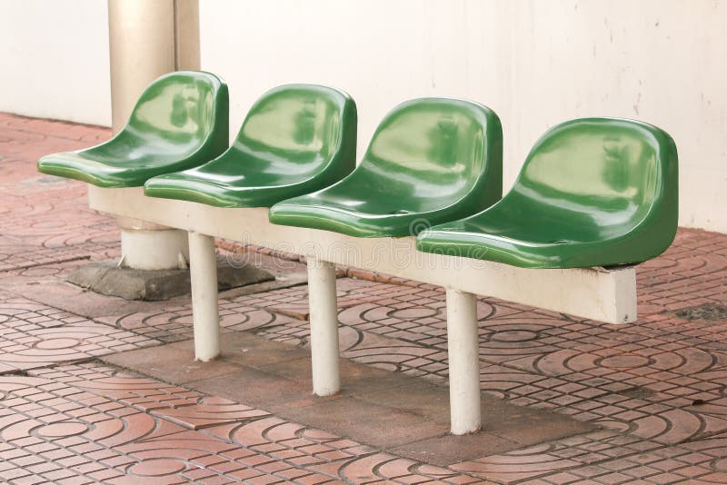Green Plastic Chair at the Bus Stop Stock Photo - Image of people ...