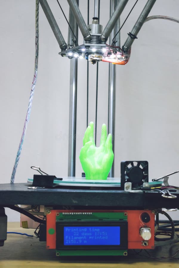 Green Plastic 3D Printed Human Hand Stands in Three-dimensional Printer ...