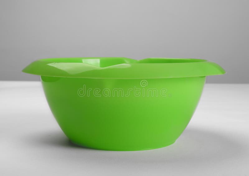 Green plastic deep bowl stock image. Image of isolated - 86849967