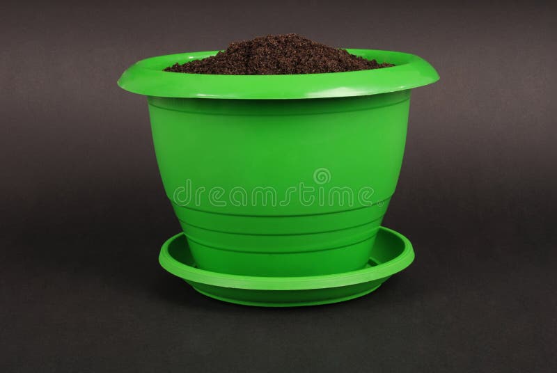 Green Plastic Flower Pots stock image. Image of flower - 146416611