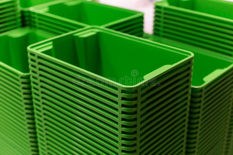 Green Plastic Home Containers Tower at Store Stock Image - Image of ...
