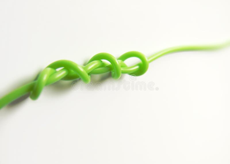 Green plastic knot stock photo. Image of backdrop, knot - 557058