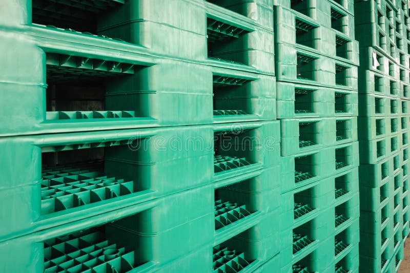 Green Plastic Pallets in Warehouse. Stock Photo - Image of path ...
