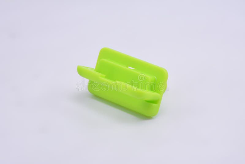 Green Plastic Push Pull Cover Plug Stock Photo - Image of cover, socket ...