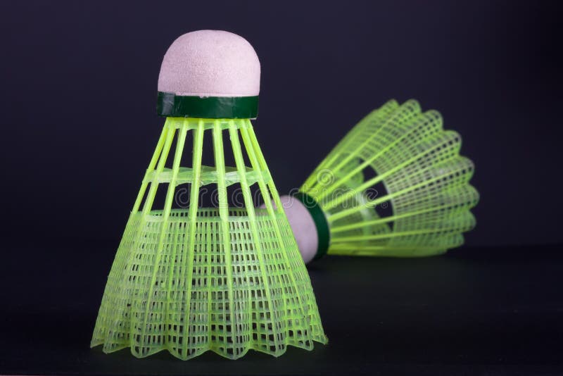 Green plastic shuttlecocks stock image. Image of background - 19549851