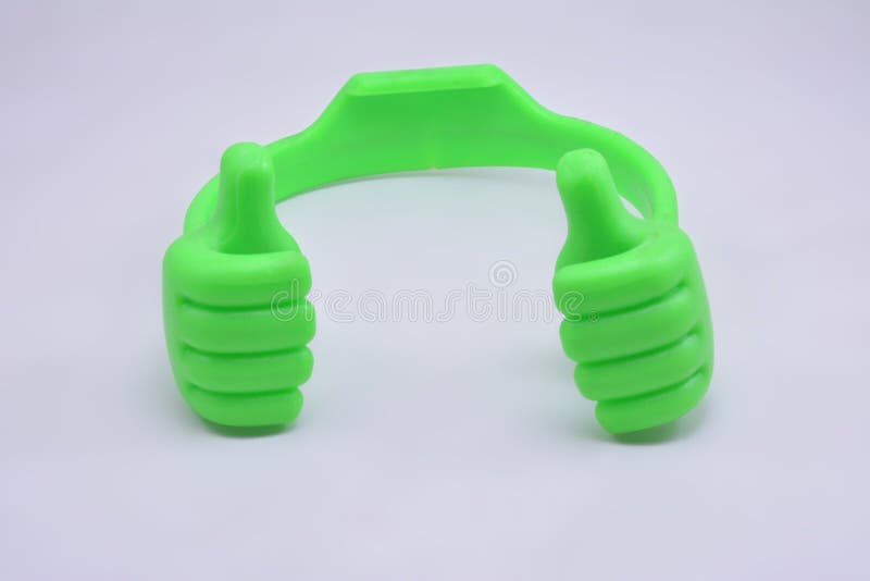 Green Plastic Smartphone Stand Holder with Arm and Hand Stock Photo ...