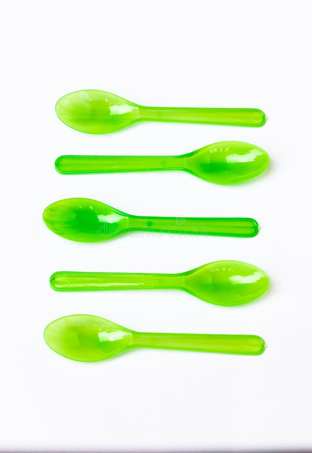 Green plastic spoon stock image. Image of utensil, collection - 58428121