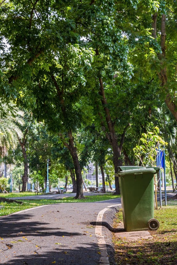 Green plastic trash can stock photo. Image of disposal - 78914618