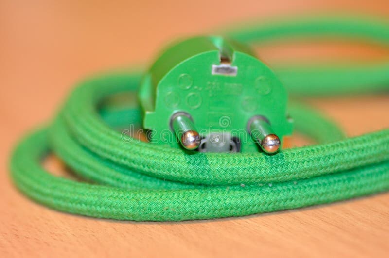 Green Plug stock image. Image of power, cable, loop, wood - 36821007
