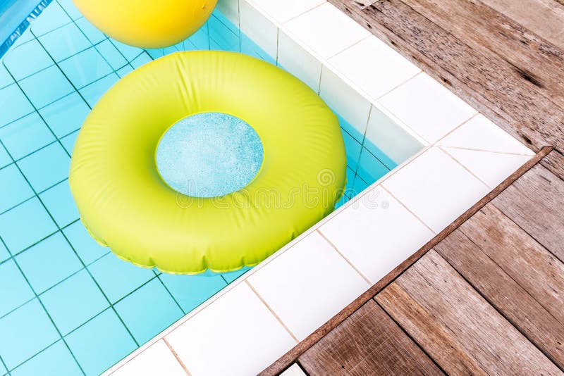 Green Pool Float, Pool Ring in Swimming Pool Stock Image - Image of ... Green Pool Float, Pool Ring in Swimming Pool Stock Image - Image of ...