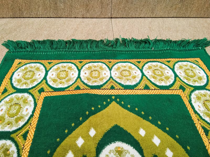A Green Prayer Rug for Prayer Stock Image - Image of arabesque, card ...