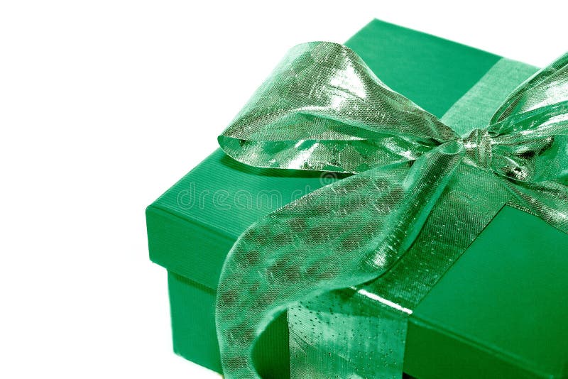 Green Present with Red Ribbon Over Snow Stock Photo - Image of modern ...