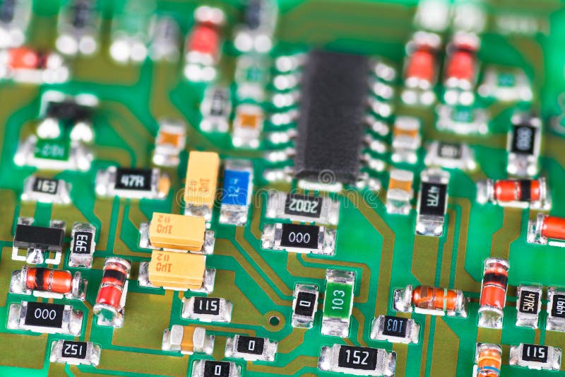 Integrated Circuit, Resistors and Capacitor Soldered on PCB Stock Photo ...