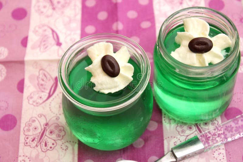 Green pudding with cream stock image. Image of jelly - 111059505