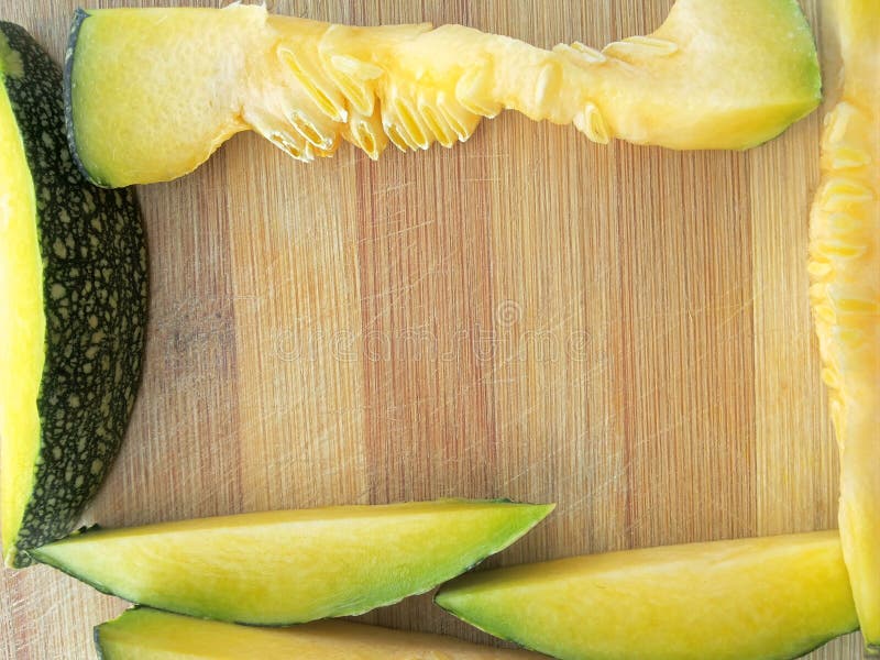 Green pumpkin pieces frame stock photo. Image of close - 69410622