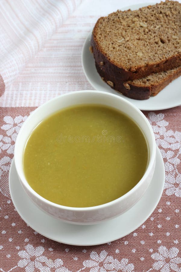 Green Pureed Soup and Brown Bread Stock Image - Image of eating, potato ...