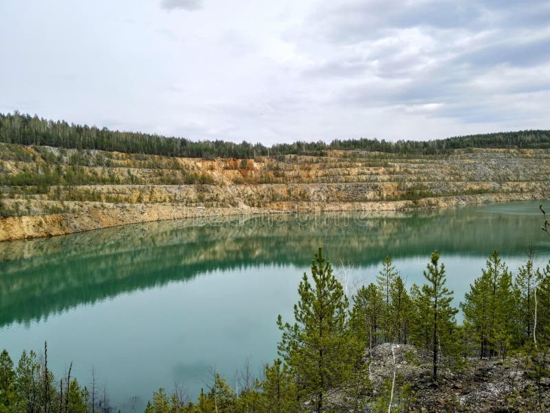 The green quarry in Russia stock image. Image of reflection - 251908911
