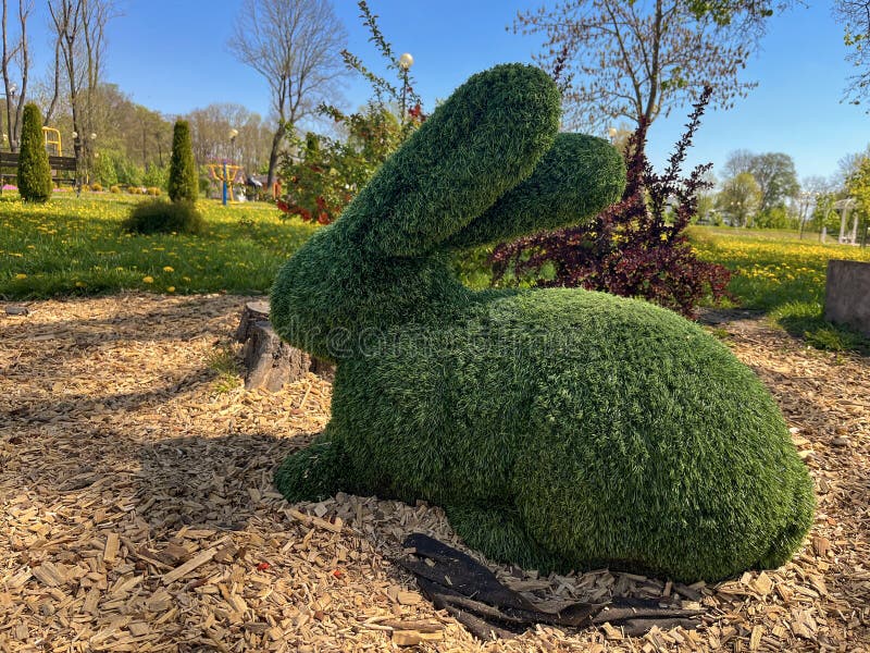 Green Rabbit Figurine in the City Park Stock Image - Image of green ...