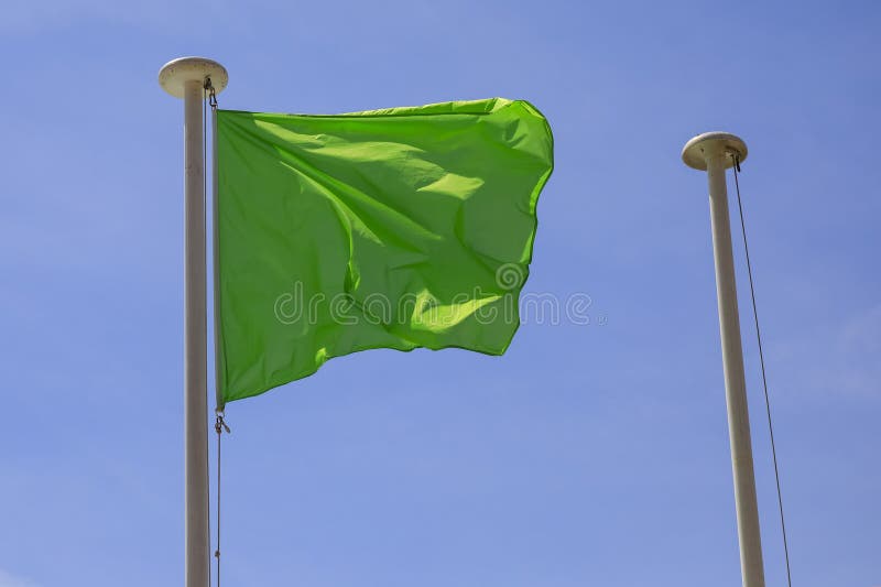 A Green Rectangular Flag on a Pole Stock Image - Image of flag ...