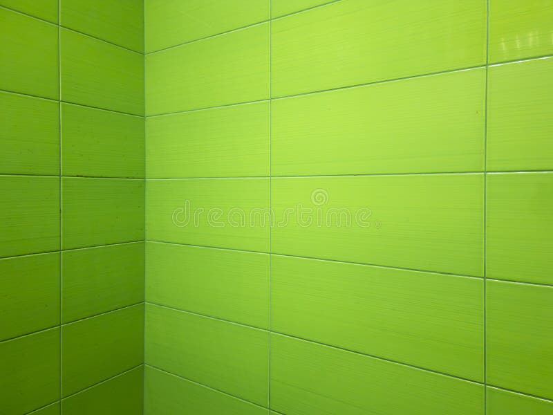 Green Rectangular Tiles Lining Bathroom Wall, Gleaming with Sleek ...