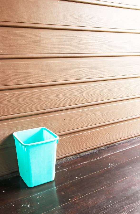 Green Recycling Bin on Wooden Floor. Stock Photo - Image of environment ...