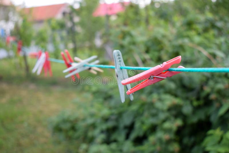 Clothes pegs on a string stock image. Image of clothespeg - 188669011