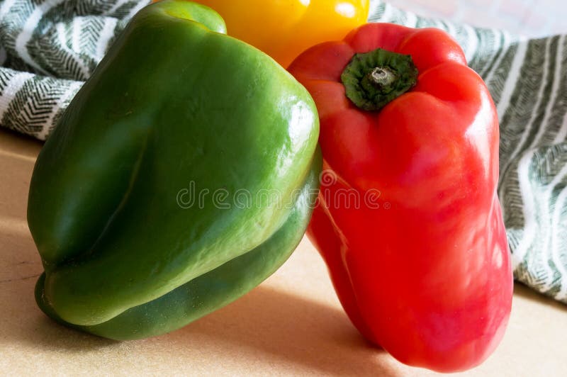 Green, Red and Part of a Yellow Bell Peppers in a Raw State Stock Photo ...