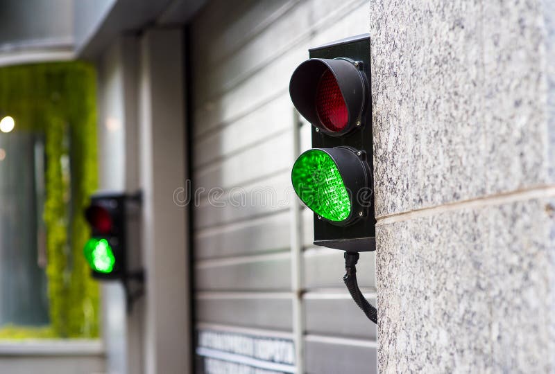 Green and Red Stop Light in Garage Stock Image - Image of barrier ...