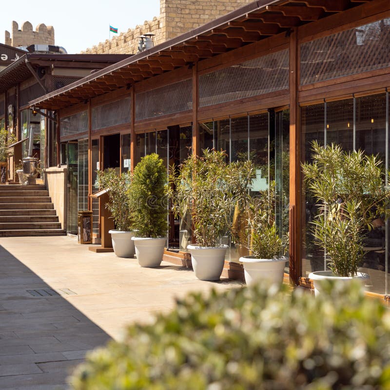 Green Restaurant Exterior View Editorial Image - Image of illuminated ...