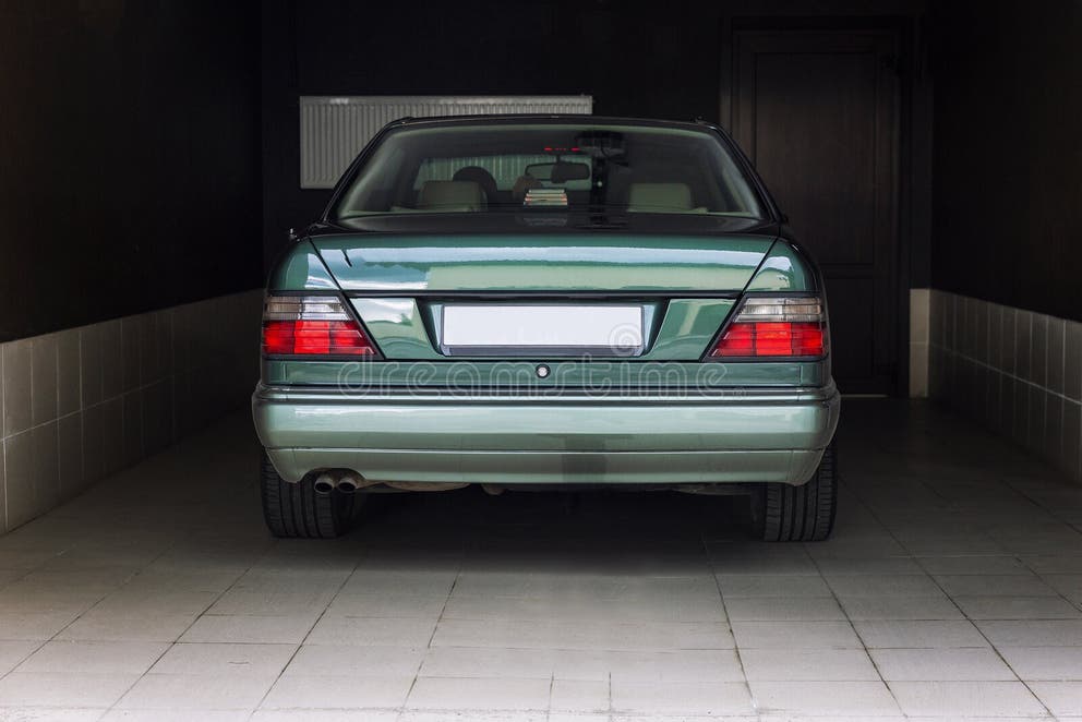 Green Retro Car in the Garage. Back View Stock Image - Image of garage ...