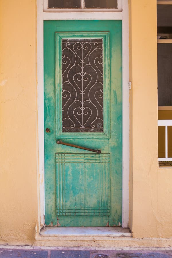 Green Retro Door with Window on the Street in Greece, Crete Stock Photo ...