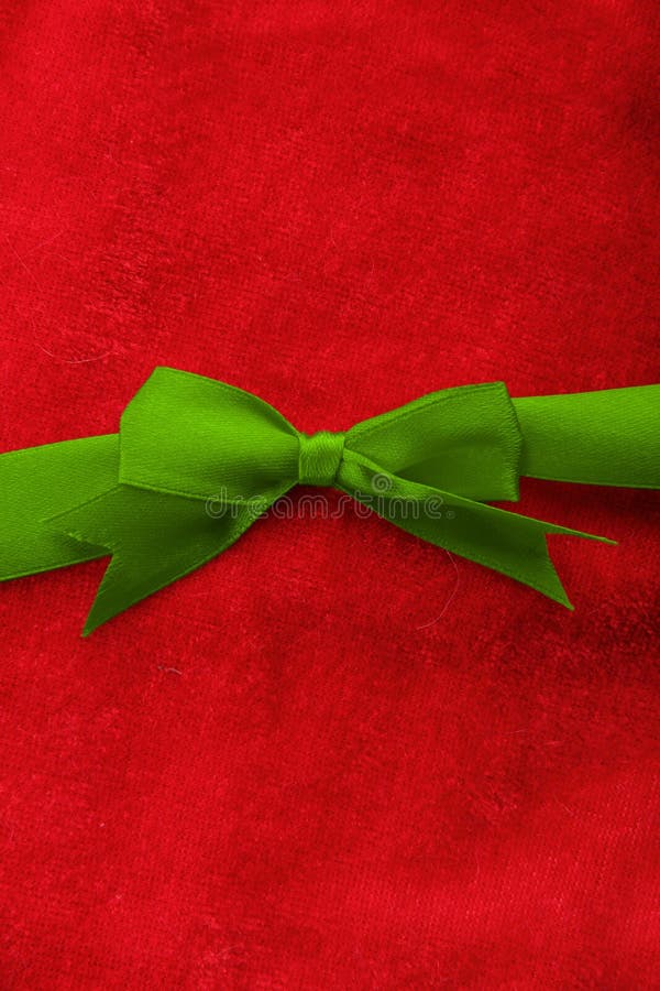 Green ribbon on red stock image. Image of frame, knot - 63222077