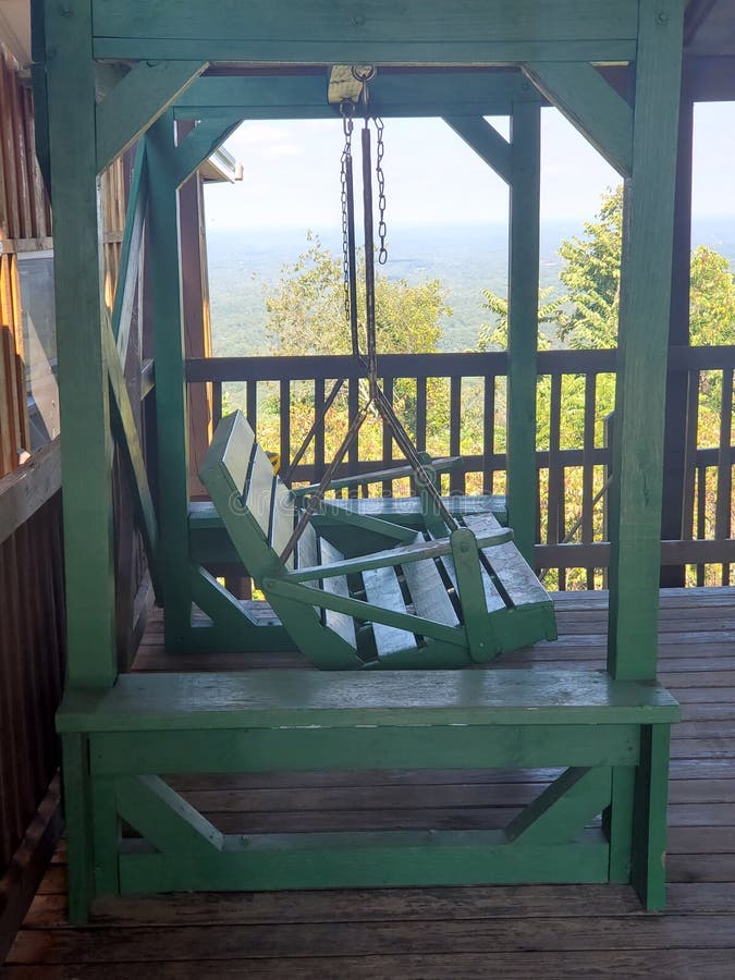 Green Rocking Chair on Isolated Mountain Cabin Stock Image - Image of ...