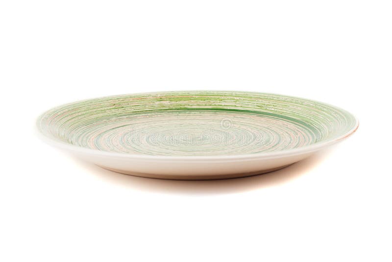 Green Round Ceramic Plate with Spiral Pattern, Isolated on White Stock ...