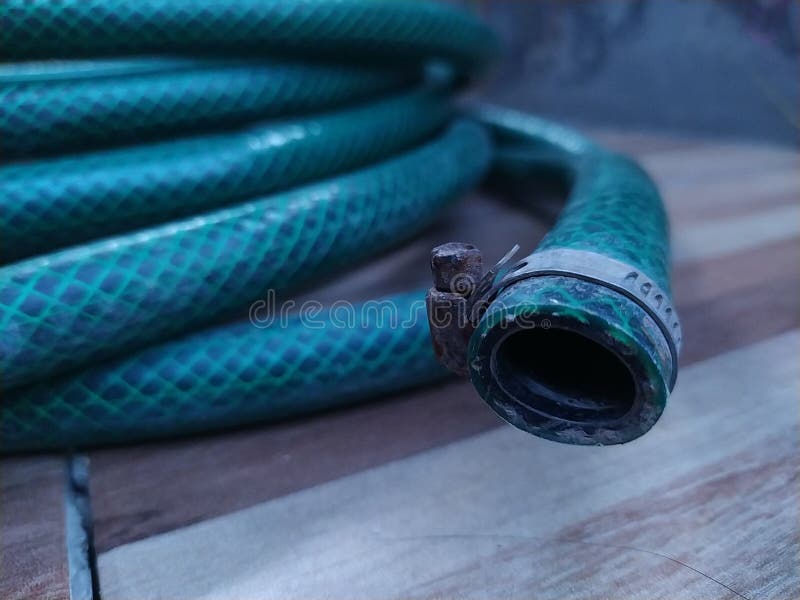Green Rubber hose stock image. Image of purple, turquoise - 198690889