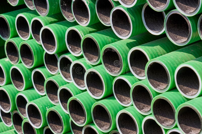Green Rubber Pipes on Construction As Background. Stock Photo - Image ...