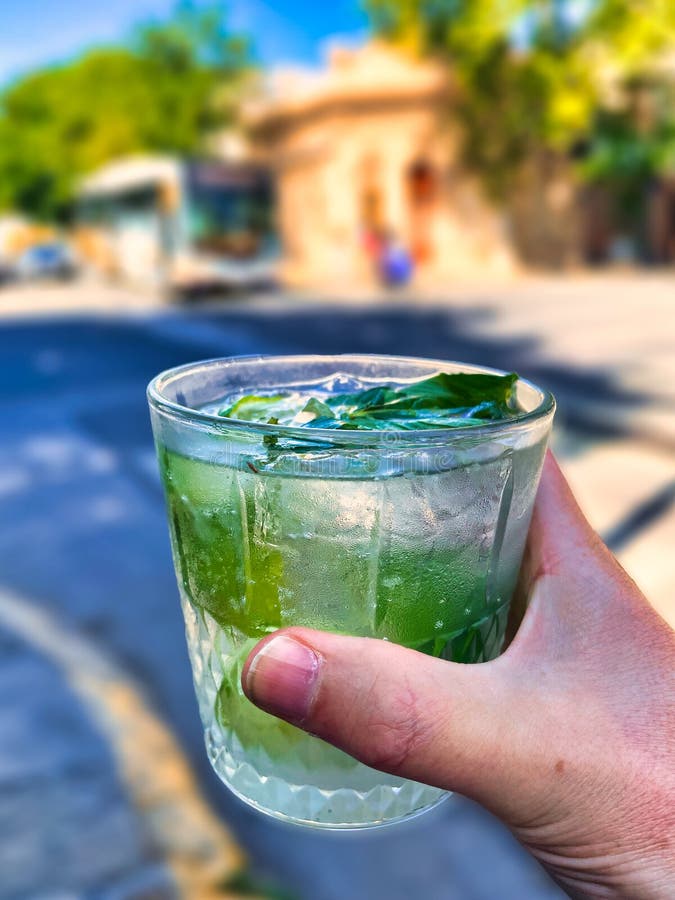 Green Rum Mojito Cocktail in Hand Stock Photo - Image of alcoholic ...