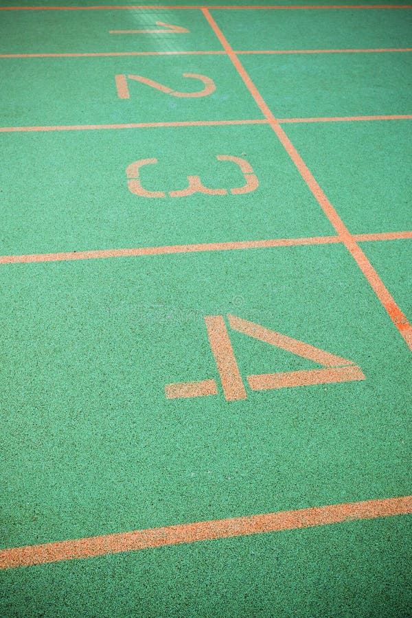 Green running track stock image. Image of textured, lane - 26171891