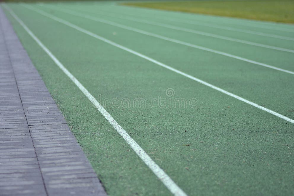 Green Running Track. Footpath in Left Side and Green Grass in Right ...