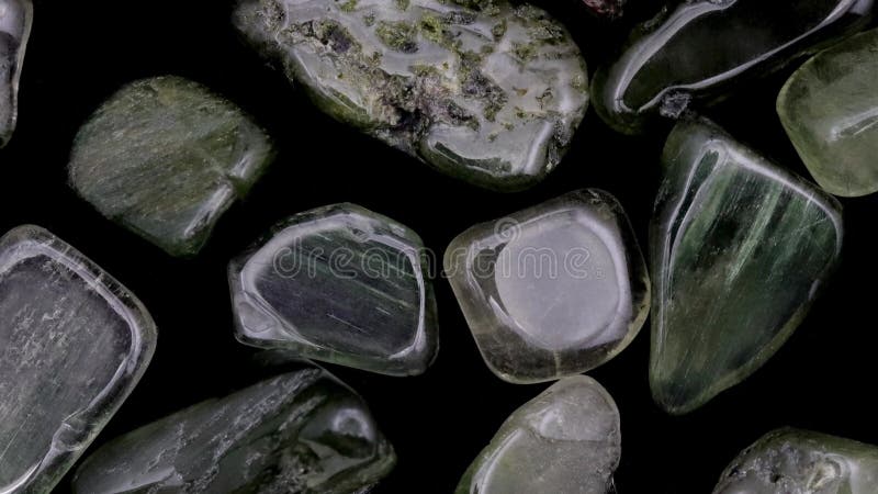 Green Rutilated Heap Up Jewel Stones Texture on Black Background ...