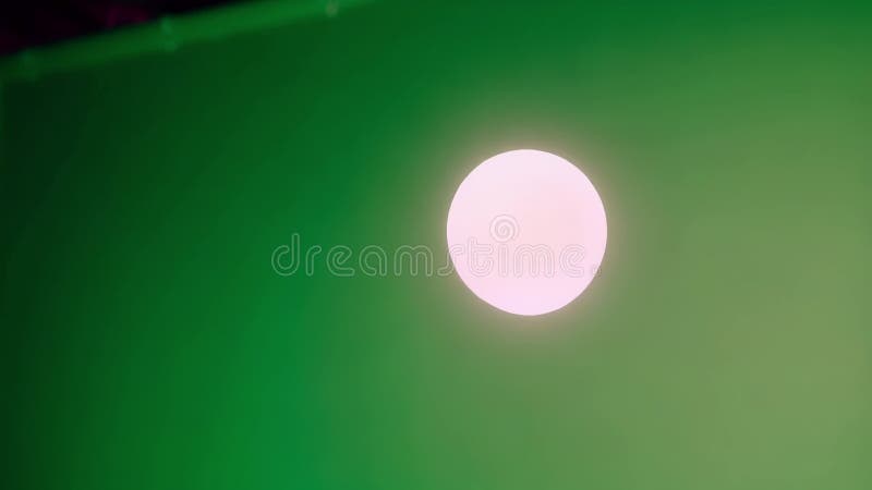 Bright Light Increasing Intensity on Green Screen Background Stock ...