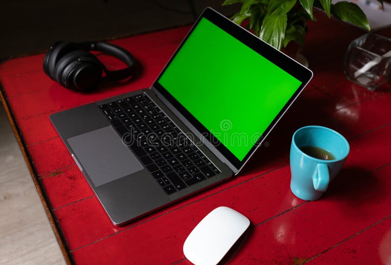 Green Screen Laptop and a Cup of Tea on a Desk Stock Image - Image of ...