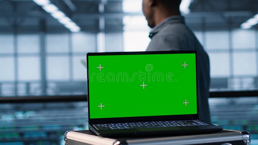 Green Screen Laptop in Front of Data Center Engineers Inspecting ...
