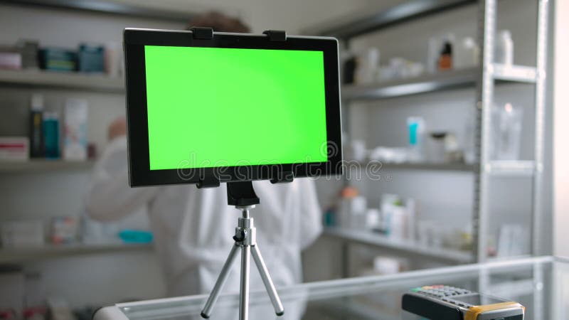 Green Screen Tablet PC Indoor of Pharmacy with Pharmacist, Checking ...